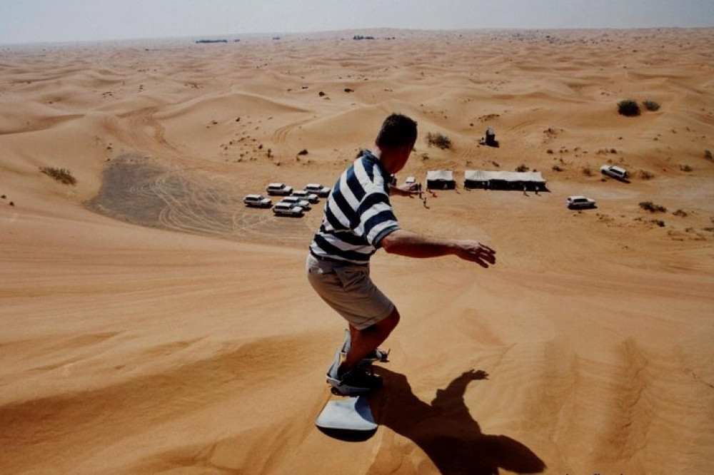 Red Dune Extreme Desert Safari Adventure with Sand Boarding - Dubai ...